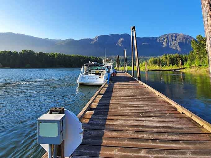 A peaceful dock extending into calm waters, offering boaters front-row seats to nature's IMAX-worthy landscape show.