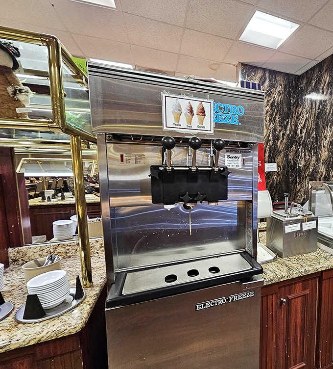 The ice cream station stands ready to deliver that final sweet note to your symphony of comfort food, because no proper meal ends without dessert.