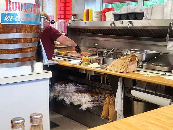 The kitchen workspace shows the organized chaos that somehow produces consistently delicious food, like a symphony conducted with spatulas.
