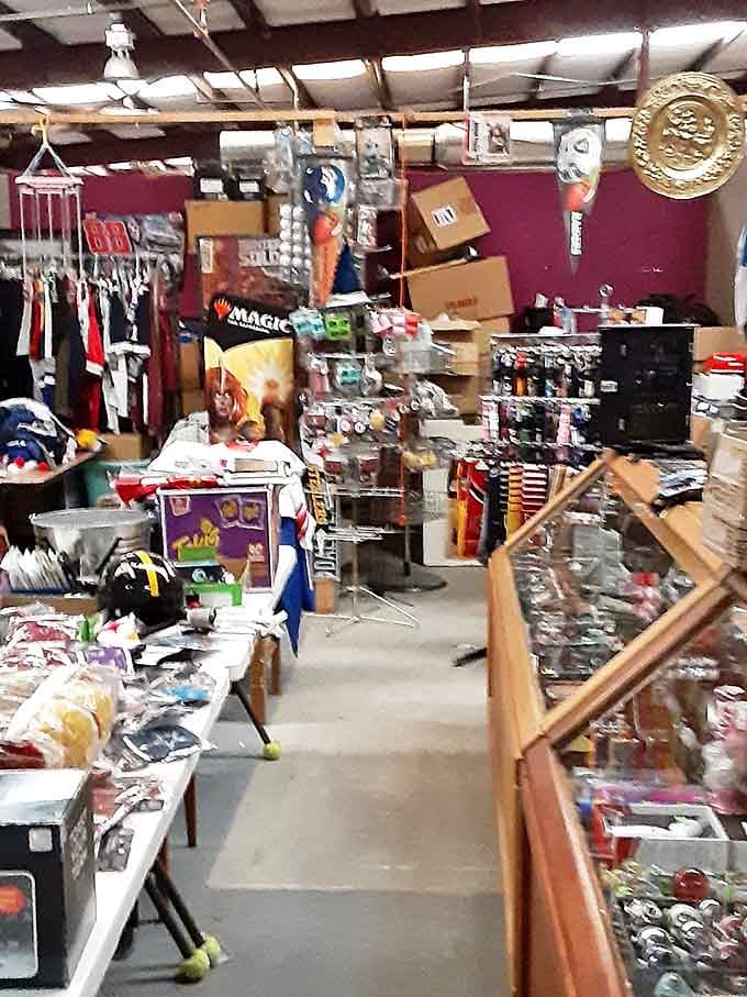 Organized chaos is an art form in this booth. From Magic cards to mystery boxes, this is where collectors come to breathe deeply.