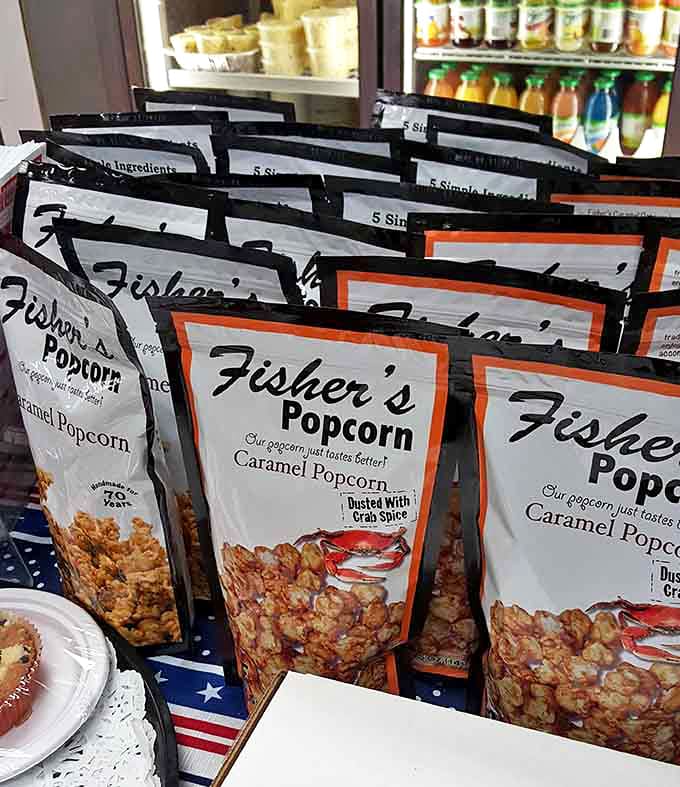 Crab-dusted caramel popcorn – because Maryland refuses to acknowledge any food that couldn't be improved with a touch of crab seasoning.