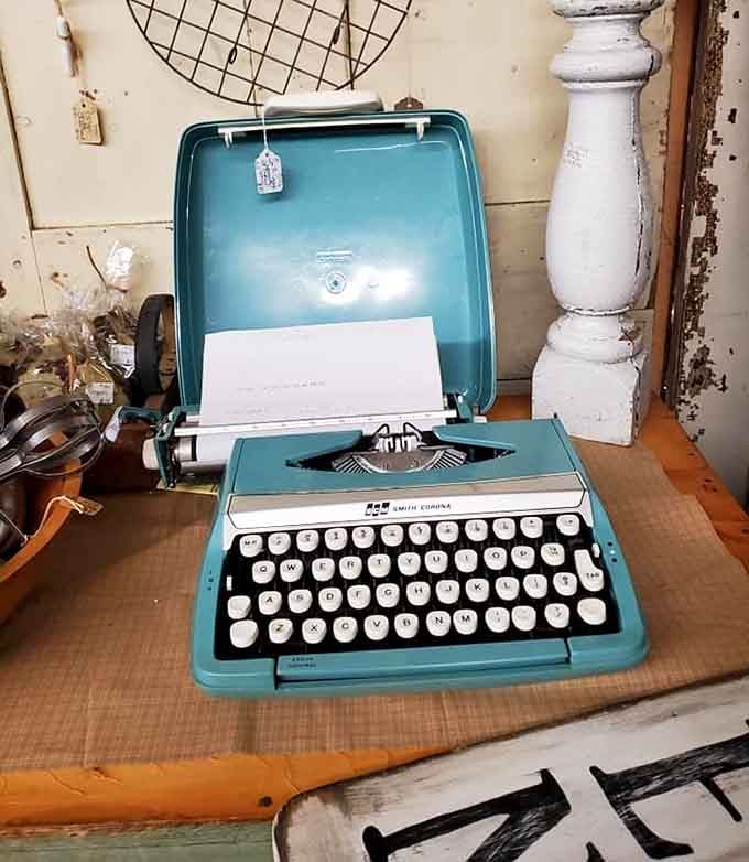 A turquoise portable typewriter that once clicked out letters, reports, and maybe even a novel or two.