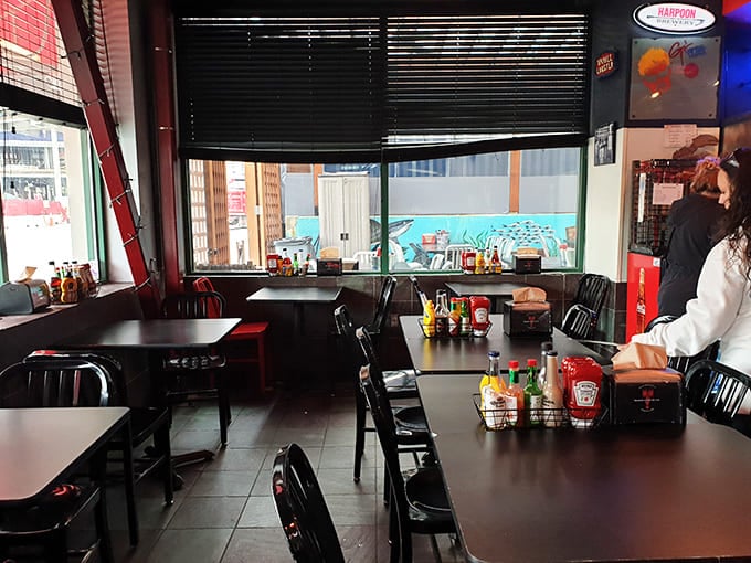 Simple tables await the day's catch and conversation, proving that great seafood needs no elaborate stage to shine.