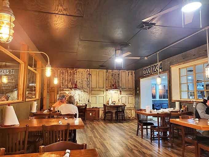 Distressed wood walls and simple tables create the perfect stage for the real star&mdash;whatever's about to arrive on your plate.