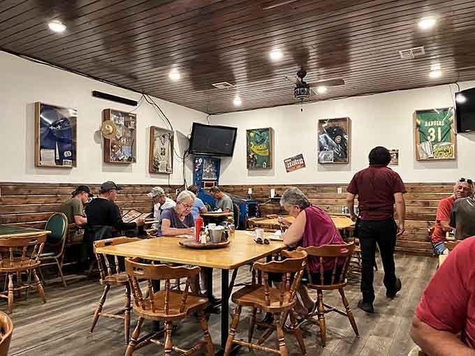 Every table tells a story, and these wooden chairs have heard them all. The sports memorabilia on the walls keeps score of countless memorable meals.