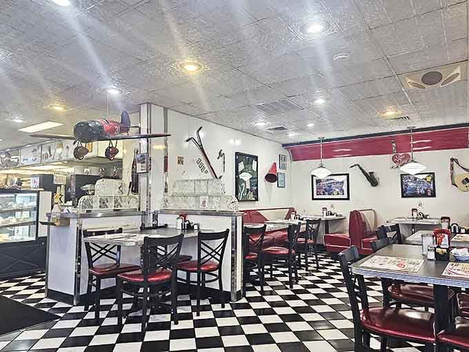 The dining room where memories are made between bites of toast. Those ceiling tiles have absorbed decades of laughter and countless coffee refills.