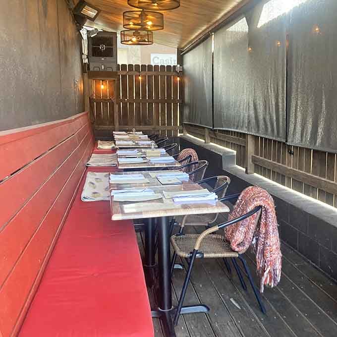 The covered patio seating combines the coziness of a friend's porch with the culinary excitement of a metropolitan bistro.