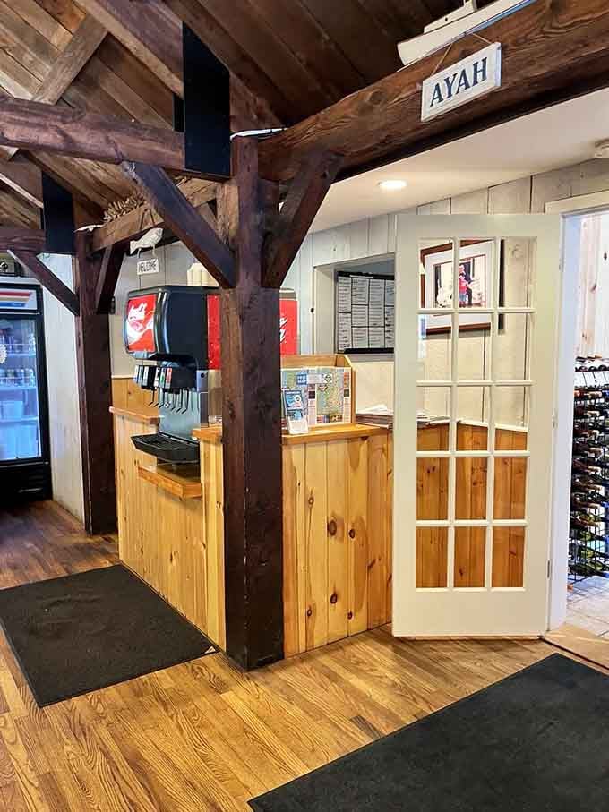 The rustic wooden beams and pine paneling create that perfect "you've arrived" feeling every seafood lover craves.