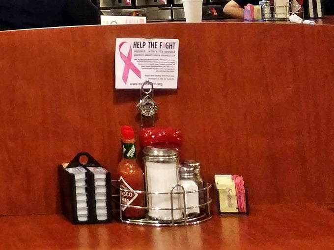 The table condiment caddy&mdash;that unsung hero of diner dining. Hot sauce, sweeteners, and salt all within arm's reach!