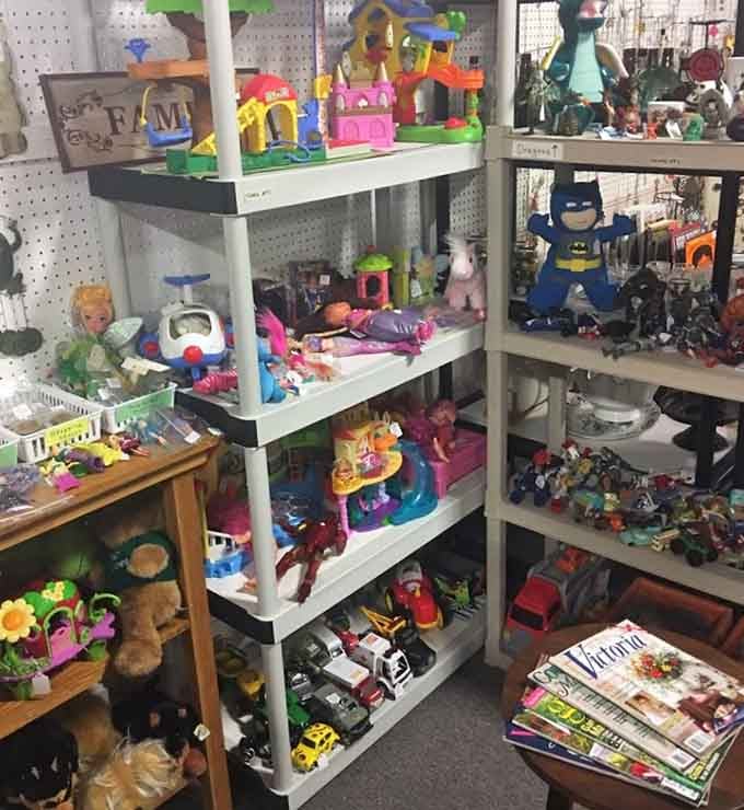 Childhood memories line these shelves. That Batman figure probably saved the day for some kid long before smartphones existed.