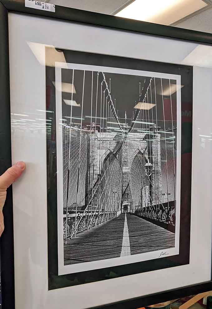 Someone's Brooklyn Bridge moment captured in black and white&mdash;proof that wall art treasures lurk between the kitchen gadgets and holiday decorations.