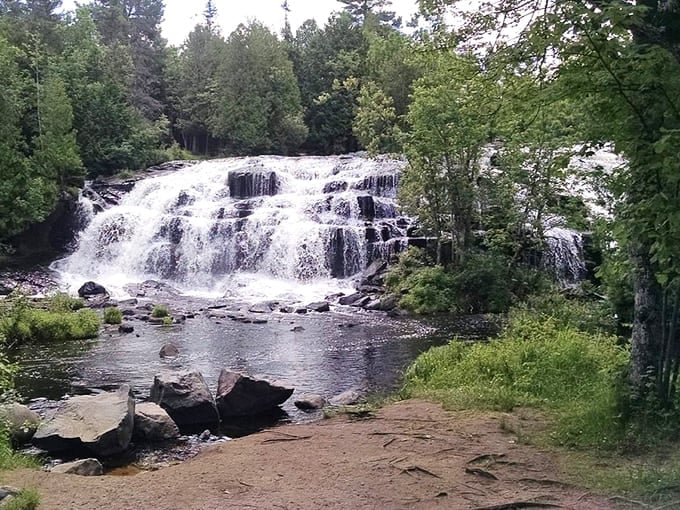 Water cascades over rocks in multiple tiers, creating that soothing sound that makes all your worries wash away.