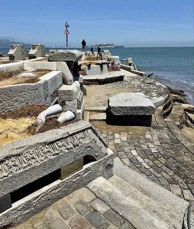 Carved stone pieces scatter across the waterfront like a giant's abandoned chess set overlooking the bay and Alcatraz.