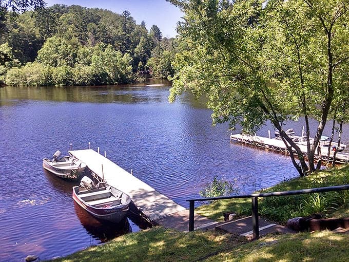 Two boats rest peacefully at the dock, waiting for their next adventure on waters that shimmer like liquid silver.