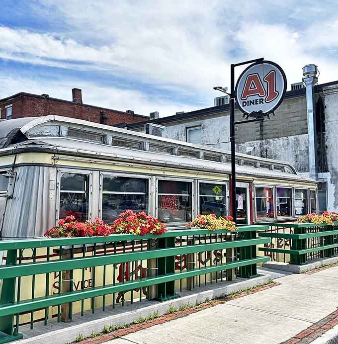 The A1 Diner's vintage Worcester Lunch Car gleams like a chrome time machine, serving nostalgia alongside comfort food classics.