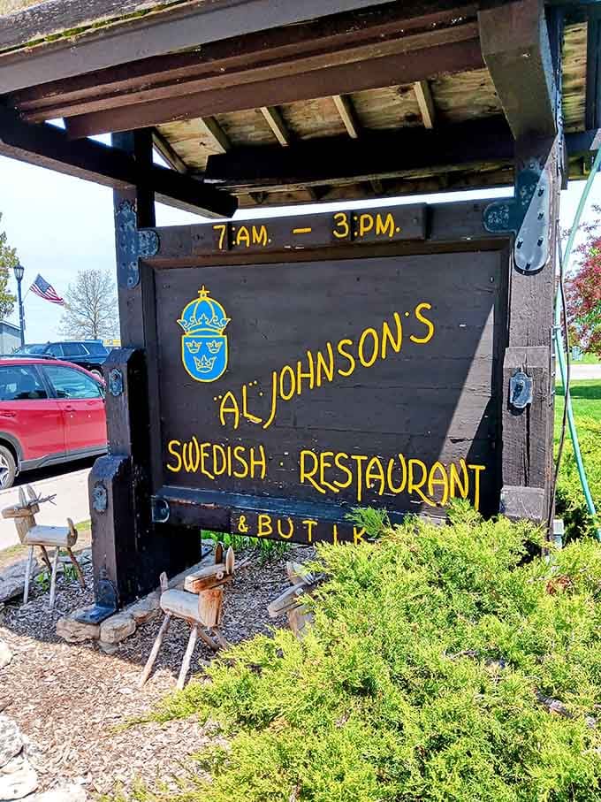 That hand-painted sign announces you've arrived somewhere special, where breakfast runs until 3 PM like civilized people intended.