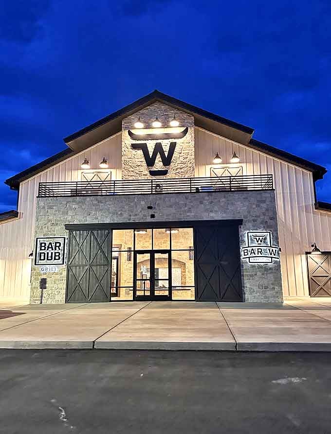 Bar W Steakhouse glows against the twilight sky, beckoning hungry travelers with the universal language of "We have meat."