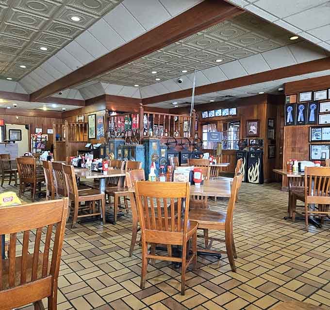 The dining room's warm wood tones and comfortable seating create the perfect no-frills atmosphere for serious barbecue enjoyment.