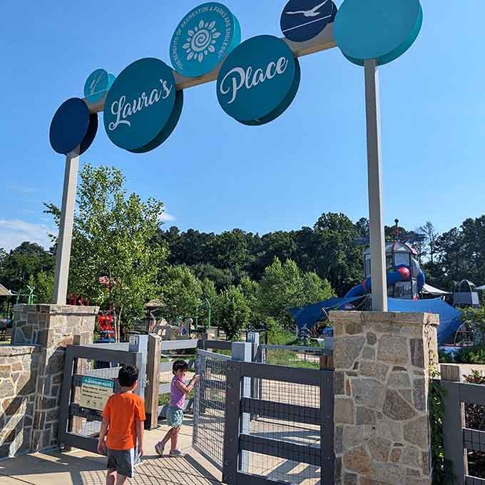 Laura's Place entrance welcomes families with style, setting the tone for the adventure that awaits inside.