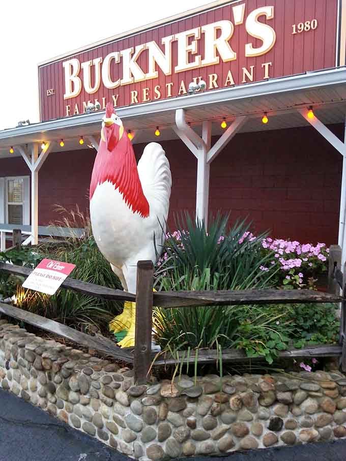 That rooster stands guard like a delicious sentinel, welcoming hungry travelers to comfort food paradise below.