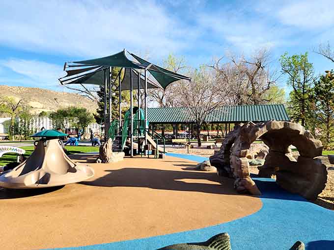 Modern playgrounds provide safe spaces where grandkids can burn energy while you enjoy mountain views.