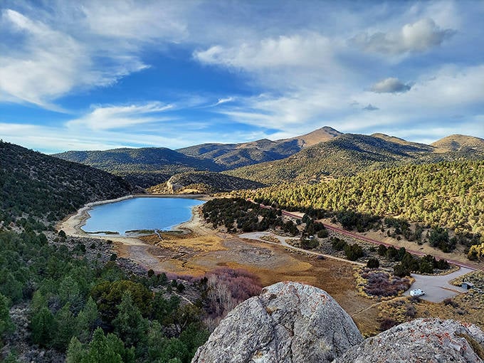 Cave Lake looks like Mother Nature's infinity pool, nestled among mountains that seem to be showing off just how photogenic they can be without even trying.