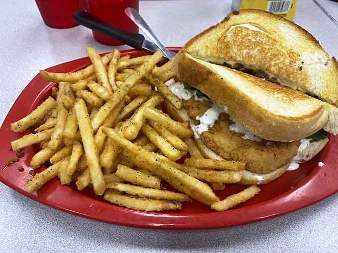This sandwich and fries combo isn't trying to reinvent cuisine—it's perfecting the classics with the confidence of a neighborhood champion.