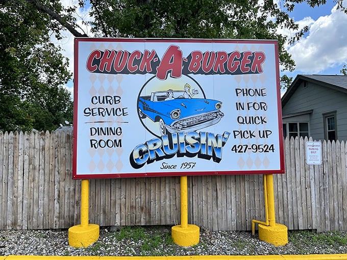That classic sign with the vintage car promises cruising, good times, and even better burgers.