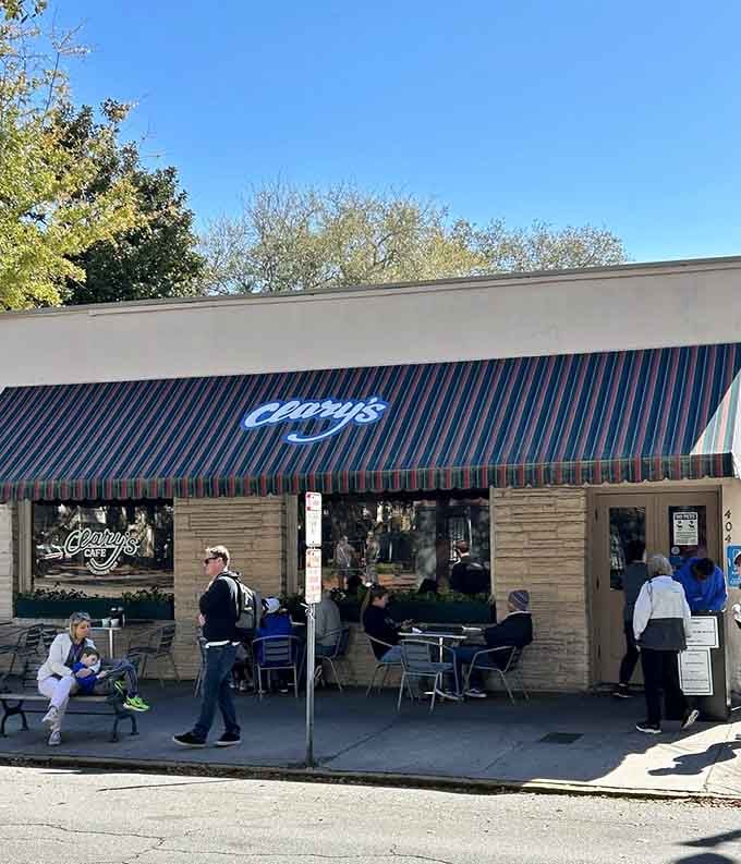 The striped awning and outdoor seating invite you to slow down and savor Savannah's breakfast scene properly.