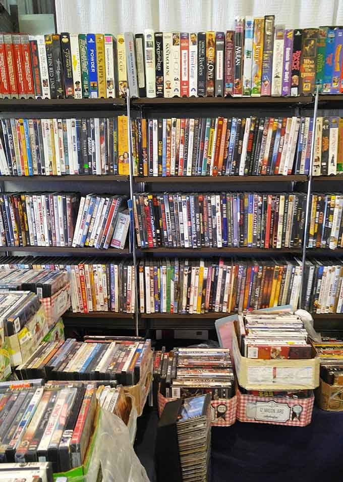DVDs stacked like a video store time capsule, back when movie night meant actual physical media.