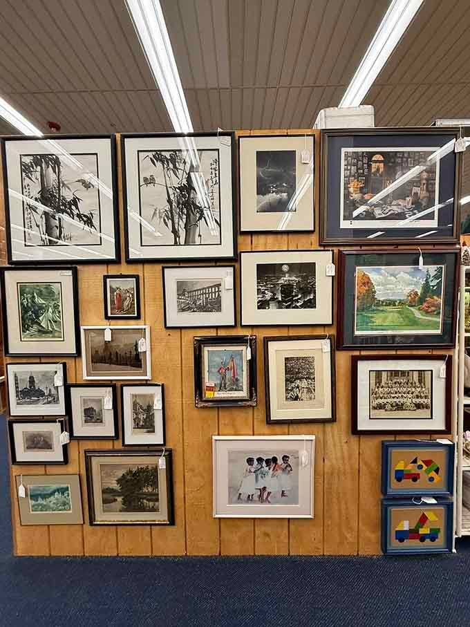 Framed artwork spanning styles and eras proves that one person's attic castoff is another person's perfect living room centerpiece waiting.