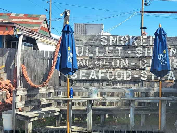 Outdoor seating with umbrellas ready for sunshine and seafood, the perfect combination for Florida dining done right.