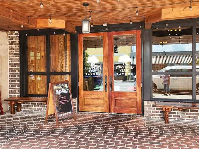 Rustic tavern vibes with wooden doors that promise good food and better company inside those walls.