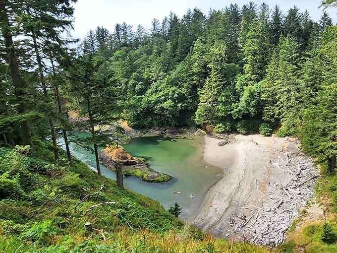 The aerial perspective reveals why this hidden cove looks like it belongs in an adventure film's opening scene.