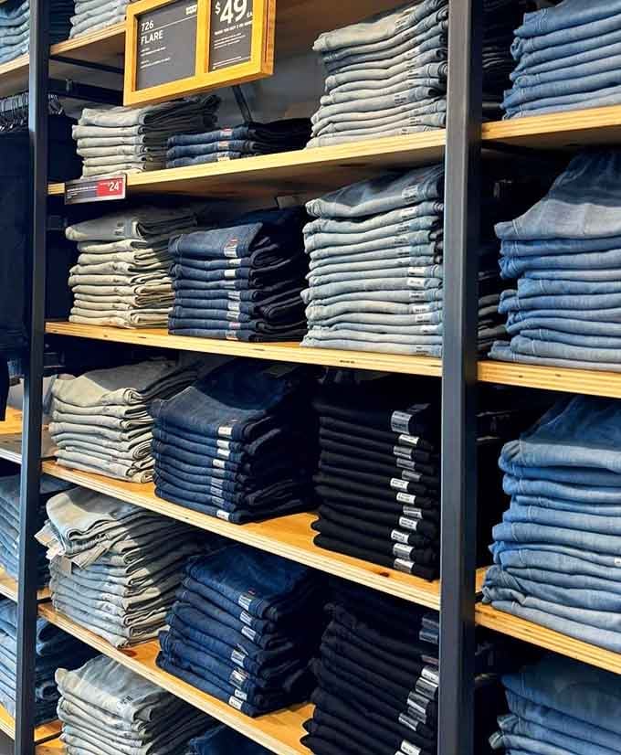 Denim jeans stacked in perfect rows, offering every wash and fit imaginable for legs of all shapes and sizes.
