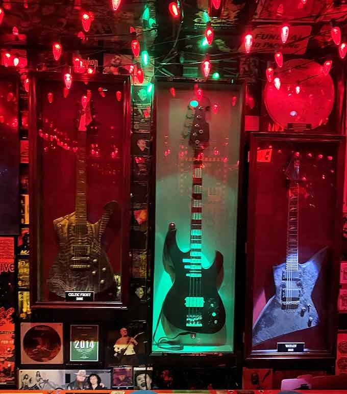Guitar shrines glow in jewel tones, celebrating rock and roll with proper reverence and flair.