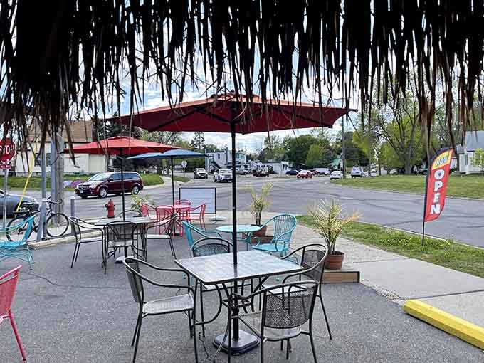 Outdoor seating under palm fronds lets you pretend you're somewhere warm, at least until the Minnesota wind reminds you otherwise.