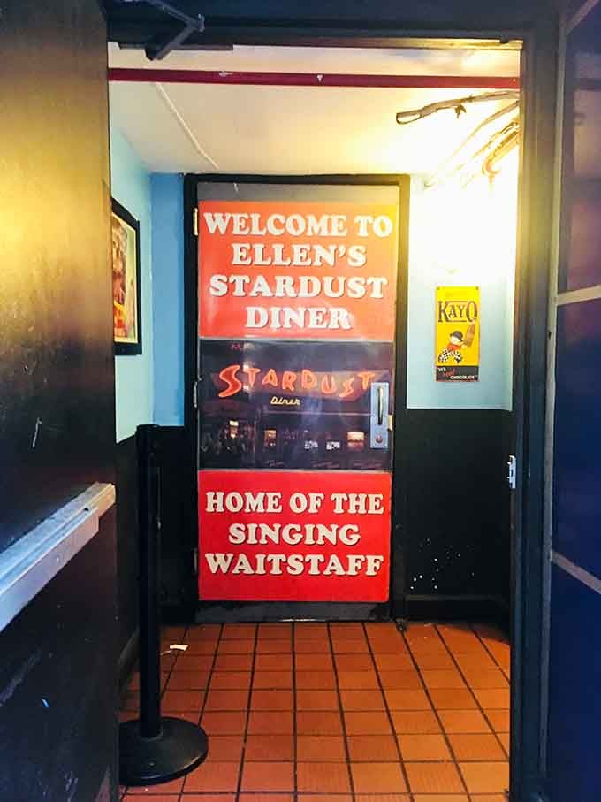 That doorway promises singing waitstaff and comfort food, two things that make any Times Square visit infinitely more memorable.