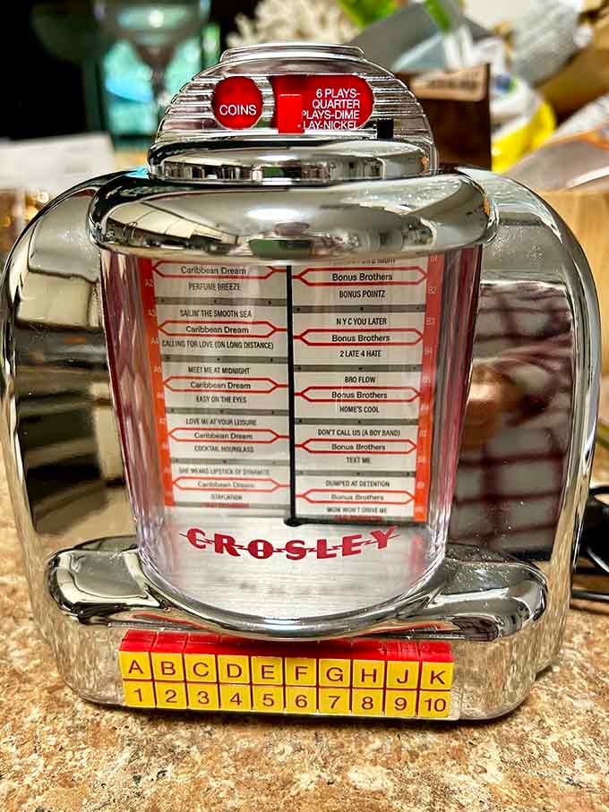 A tabletop Crosley jukebox that's basically a time machine disguised as a music player, quarters optional.