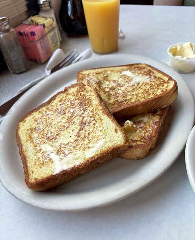 French toast so perfectly golden, it could win beauty pageants if breakfast foods competed in such things.