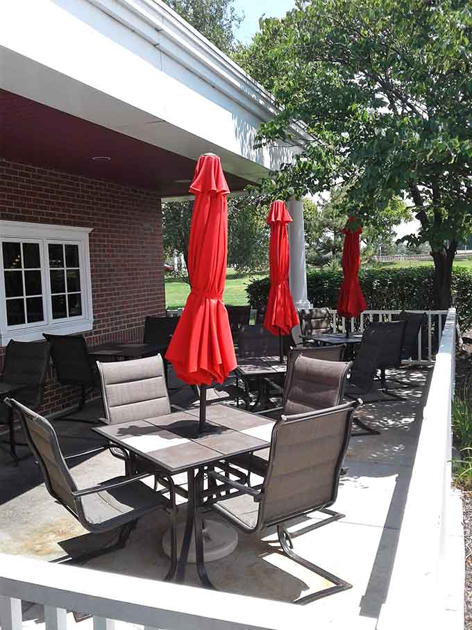 Shaded patio seating lets you enjoy Kansas City barbecue while pretending you're not completely overdoing it.