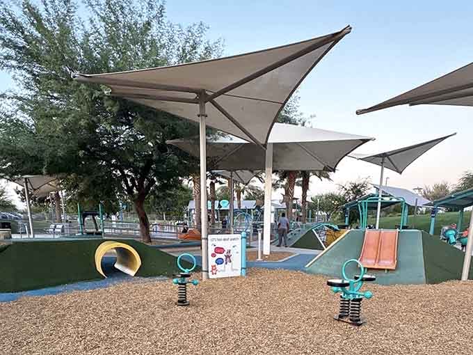 Shade sails provide crucial relief from the Arizona sun, making summer visits actually survivable and somewhat pleasant.