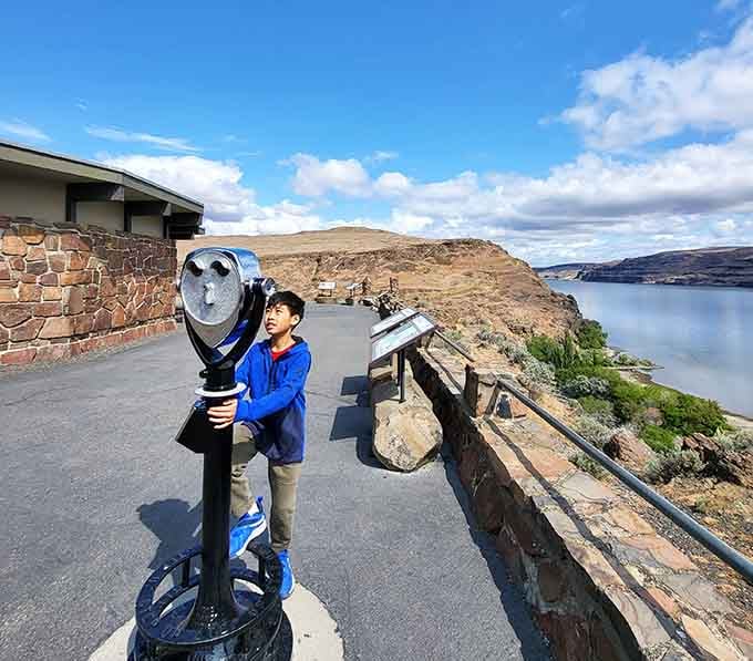 Young visitors discovering that history isn't boring when it's literally written in stone all around you.