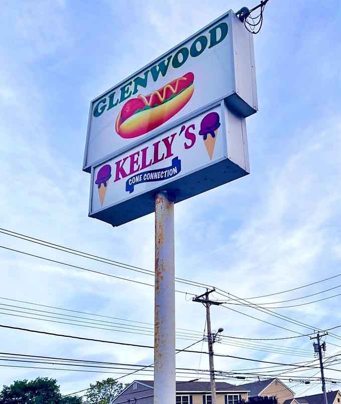 The vintage roadside sign advertising both hot dogs and ice cream is a beacon for anyone craving classic American fare.