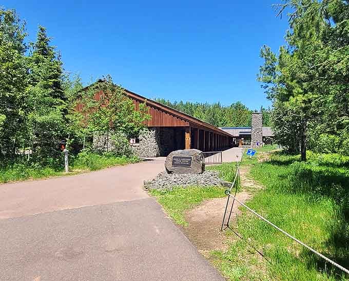 The visitor center welcomes you with that classic North Woods architecture that says "adventure starts here, friend."