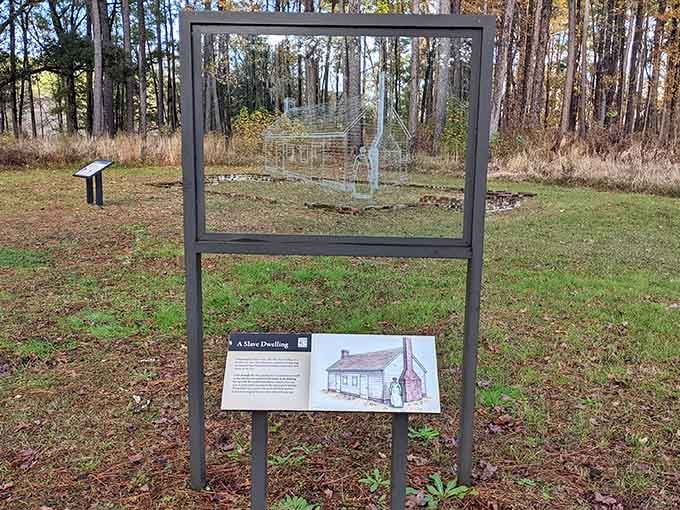 This simple frame marks where enslaved people lived, a stark contrast to the grand house that their labor built.