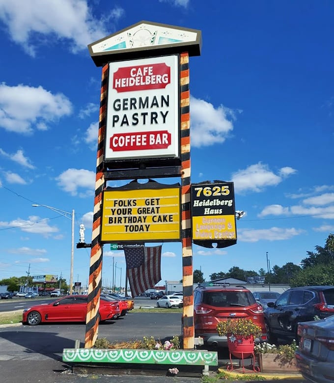 That sign promises German pastry and coffee, but the real draw is the gnome army waiting inside.