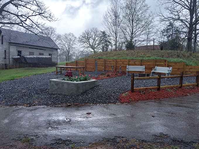 Someone added modern benches and landscaping, creating an oddly hopeful rest stop amid all this beautiful, melancholy decay.