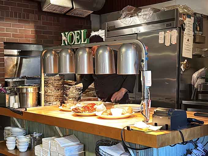 The plating area where magic happens, transforming raw ingredients into the kind of meals that create lifelong customers.