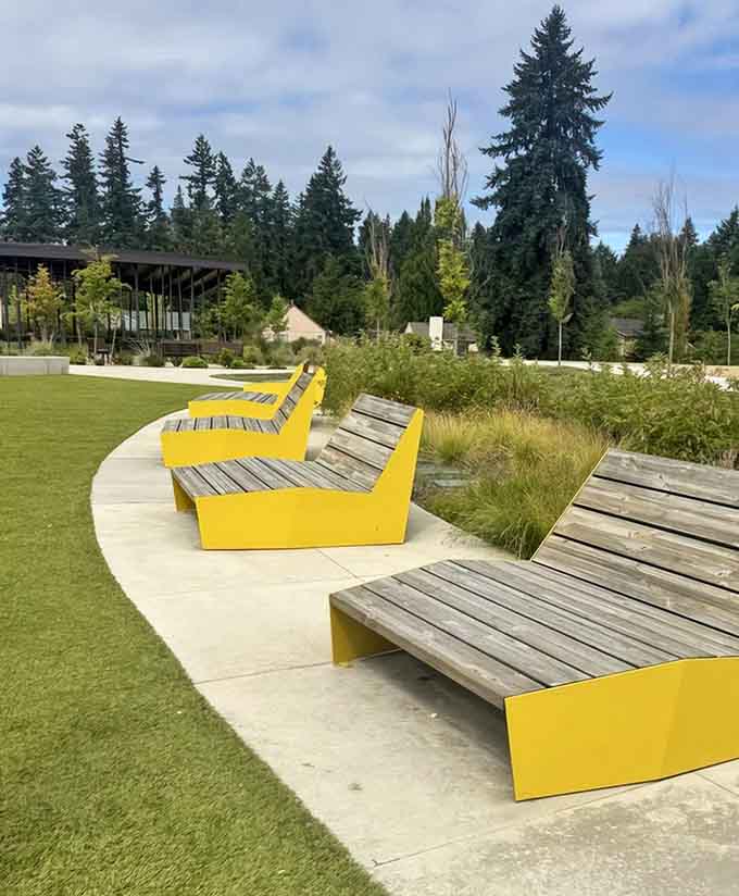 Bright yellow seating invites lounging and people-watching, the perfect spot for parents playing the long game.